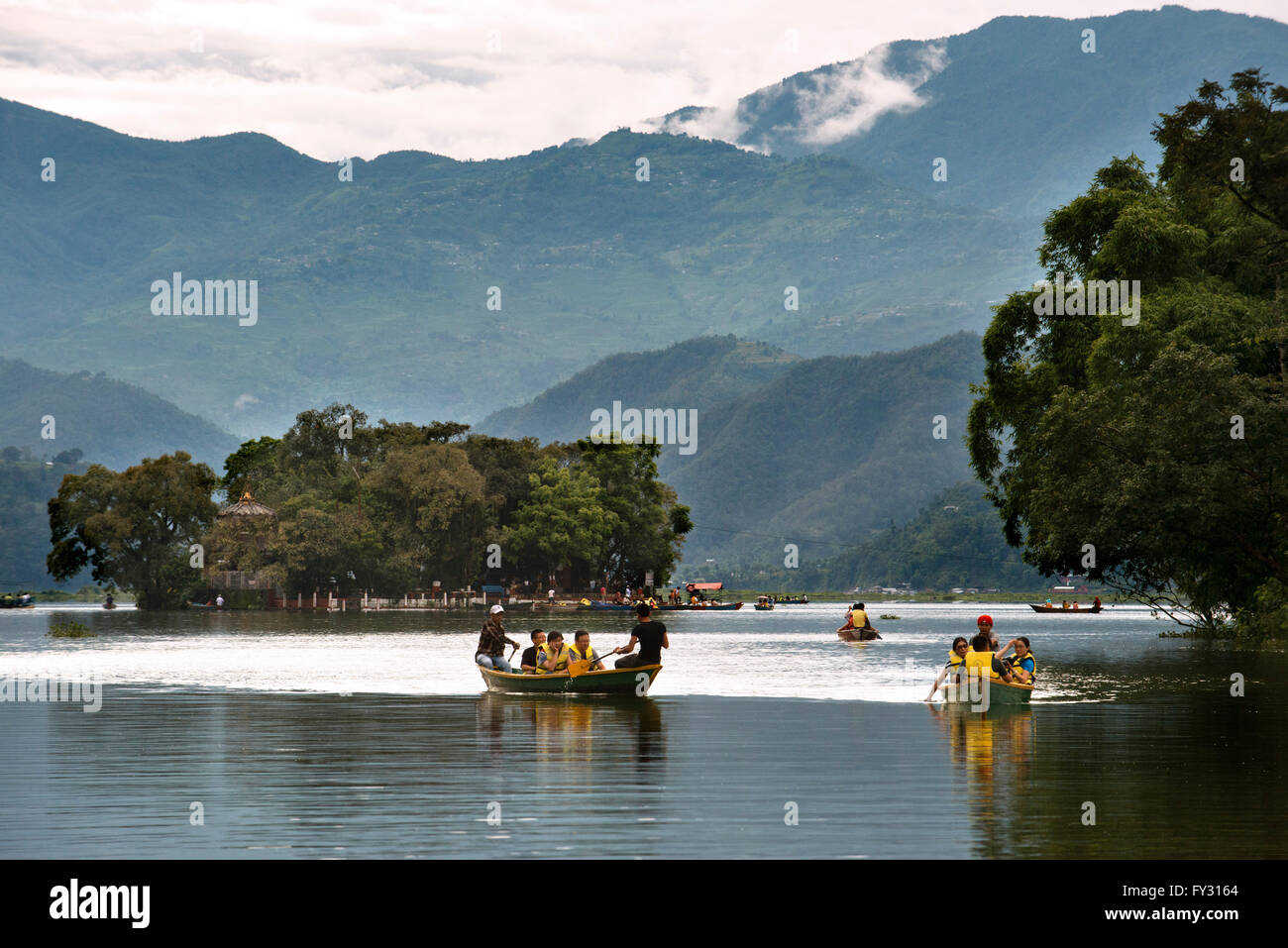 Tourists boat on Lake Phewa, South of Pokara, Nepal Stock Photo - Alamy