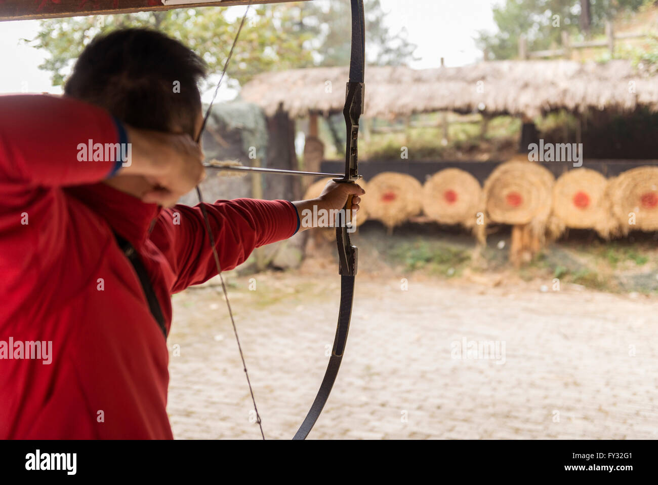 Man Shooting A Bow High Resolution Stock Photography and Images - Alamy
