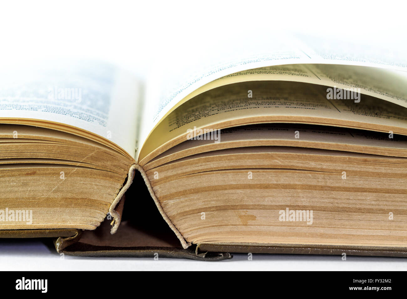 Closeup of old open book fading away to white background Stock Photo ...