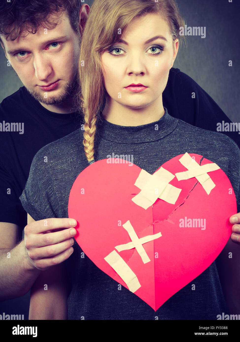 Broken heart difficult love concept. Sad unhappy couple woman and man ...