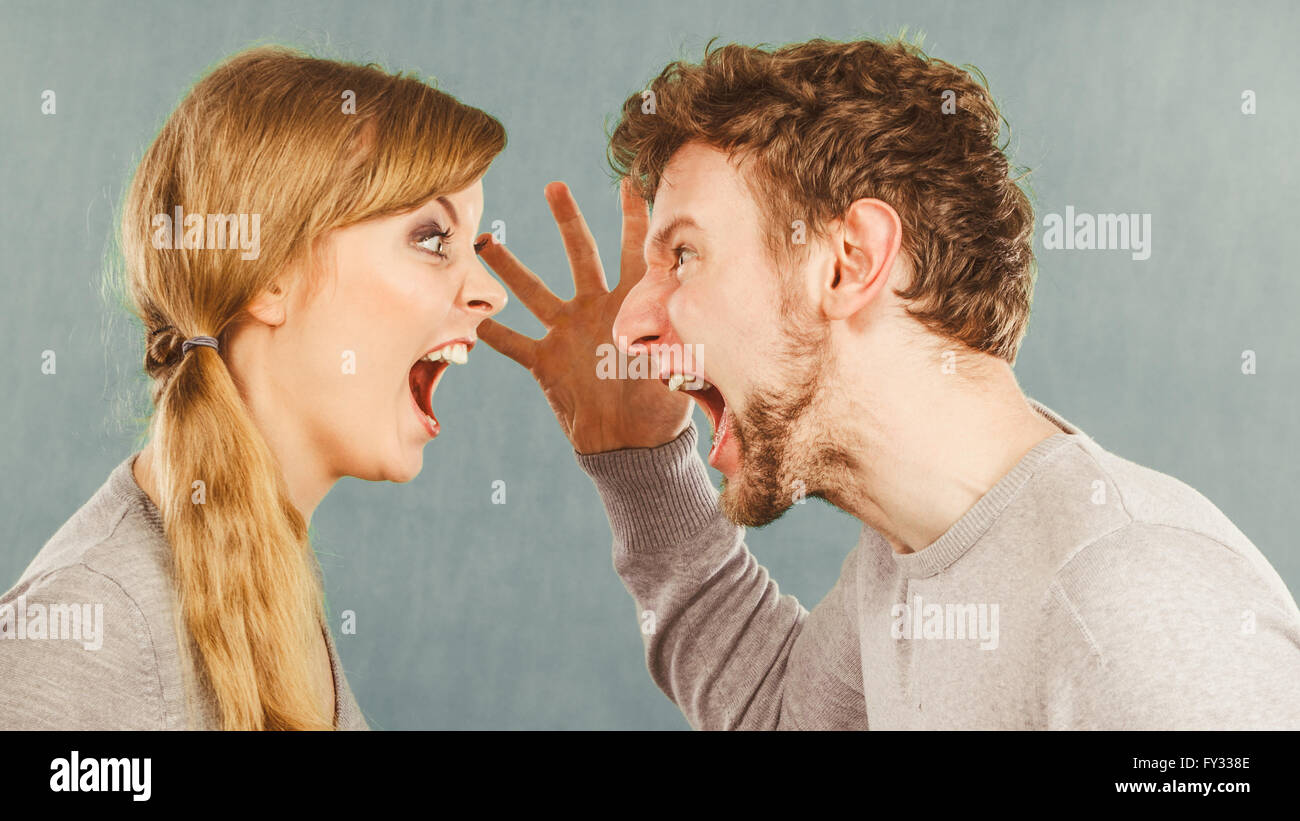 Bad relationship and divorce. Expressive young couple yelling shouting ...