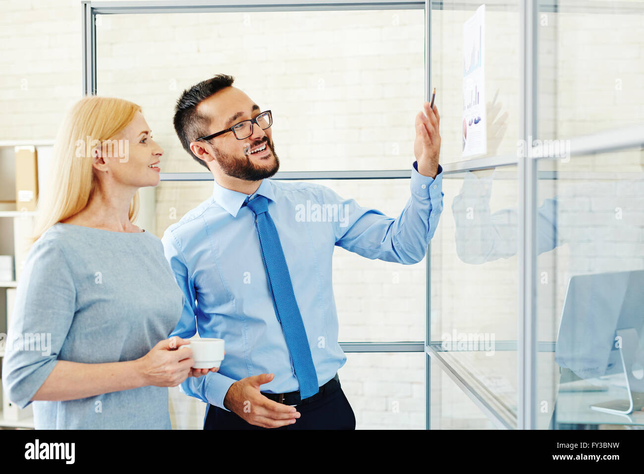 Talk to a partner Stock Photo - Alamy
