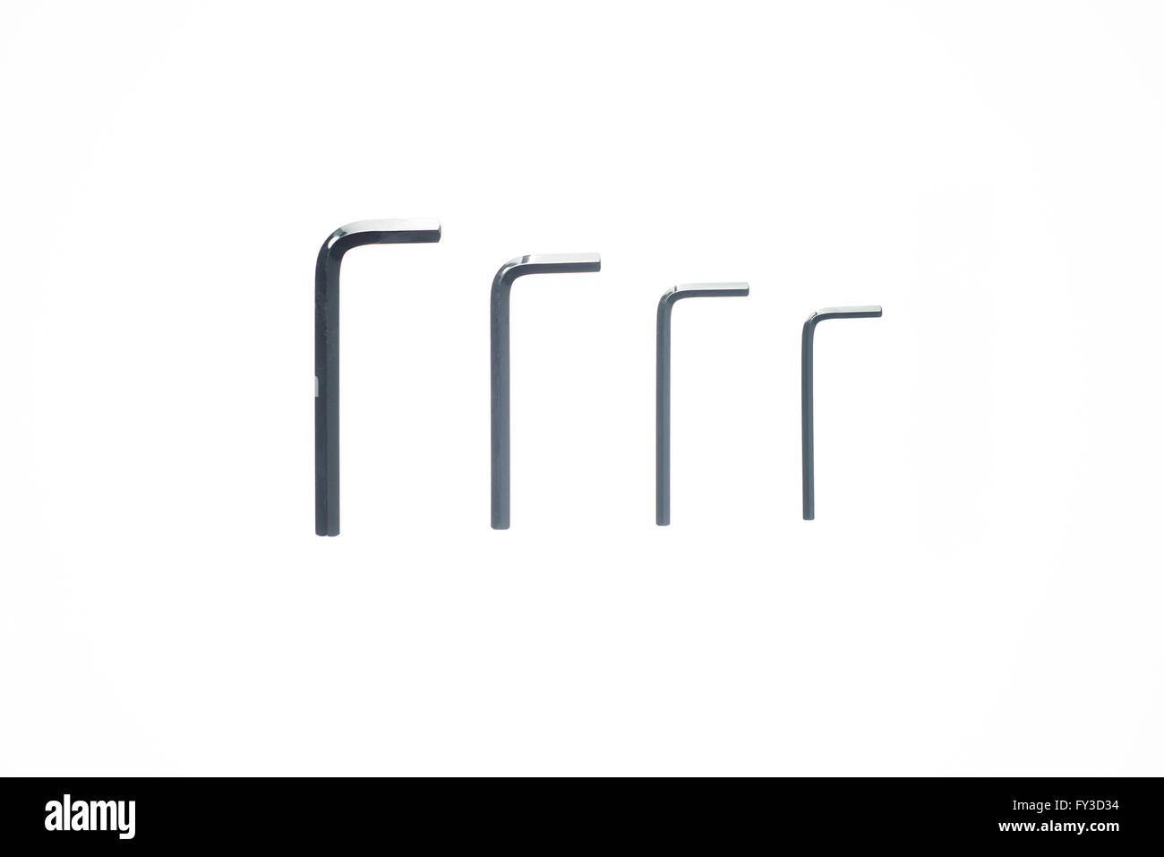 four allen keys on white background Stock Photo - Alamy