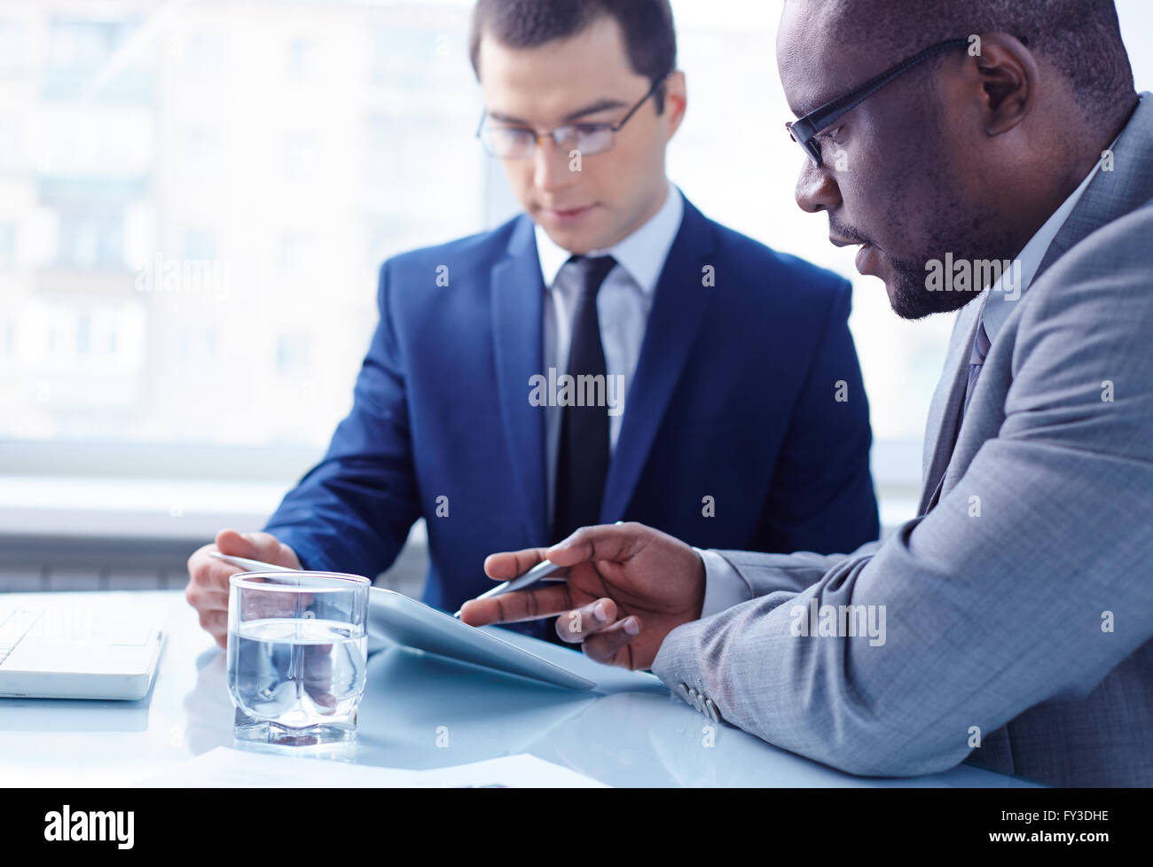 Business meeting serious blue hi-res stock photography and images - Alamy