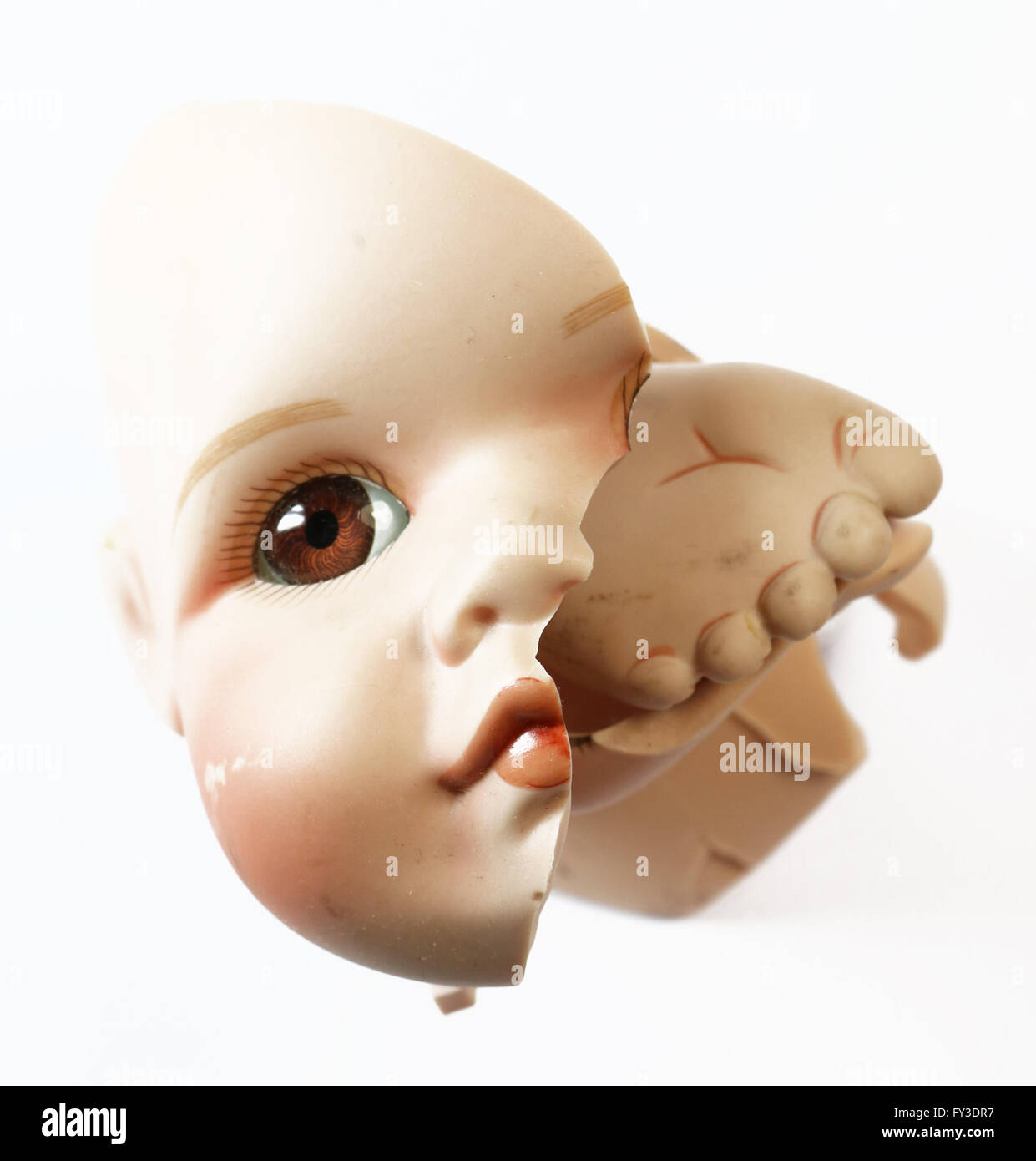 Broken Dolly Face and Limbs Stock Photo - Alamy