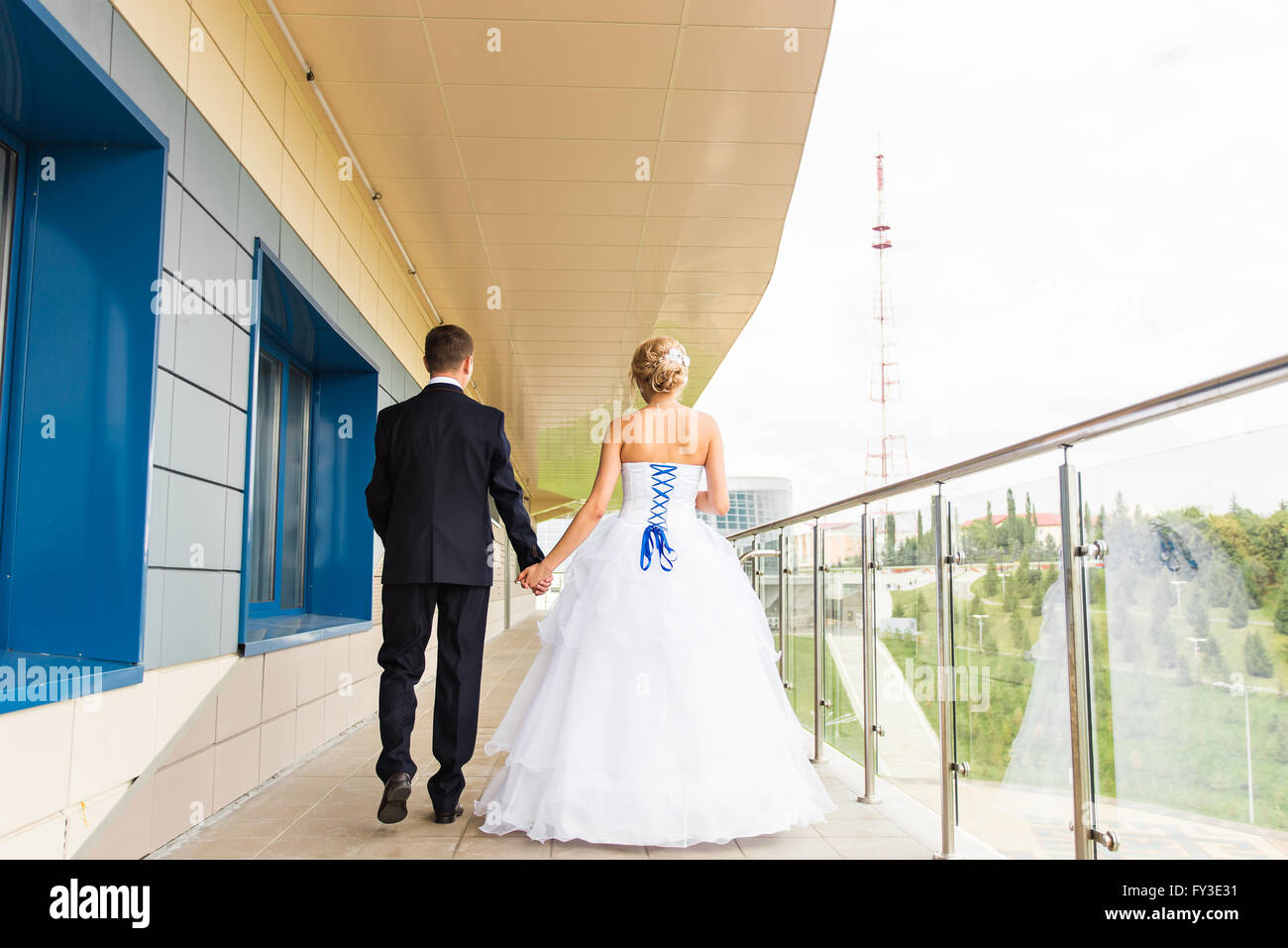 Nice young wedding couple outdoors Stock Photo - Alamy