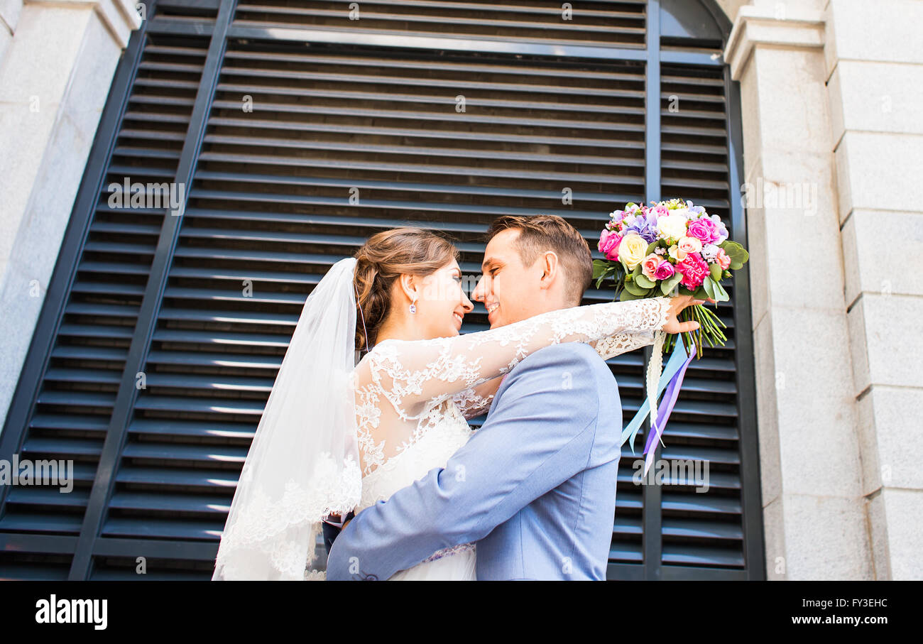 Stylish beautiful happy bride and groom, wedding celebrations outdoors ...