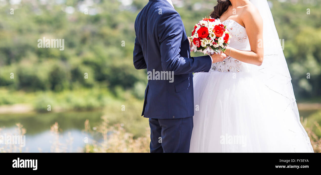 Stylish beautiful happy bride and groom, wedding celebrations outdoors ...