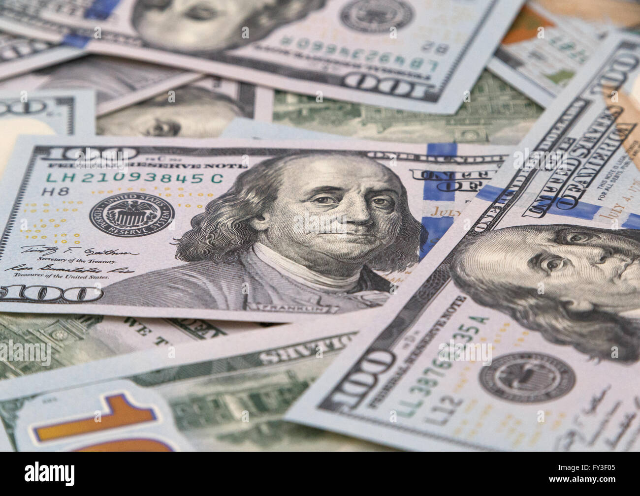 heap of one hundred dollars banknotes Stock Photo - Alamy