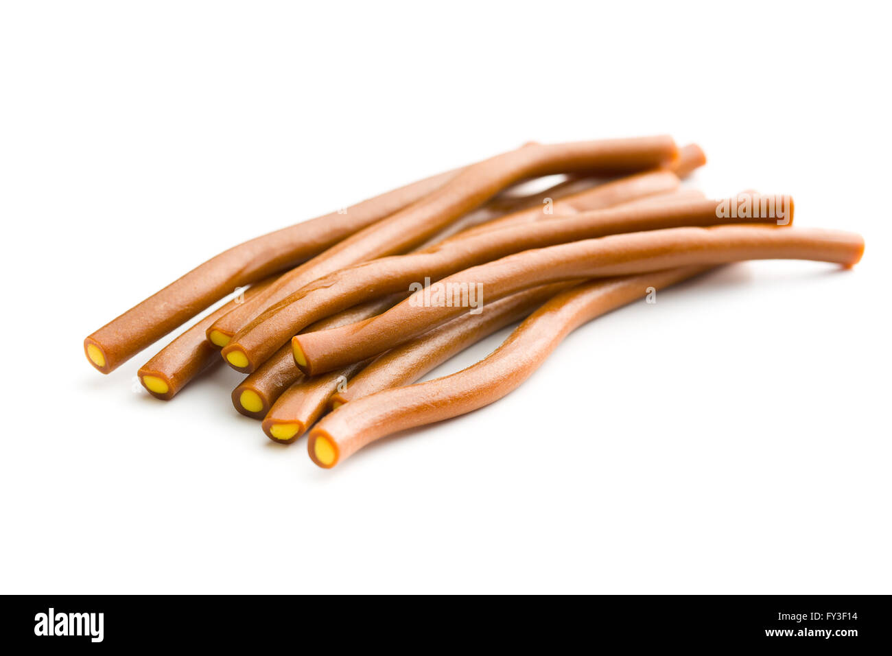 Sweet gummy sticks with cola flavor. Tasty candies isolated on white ...