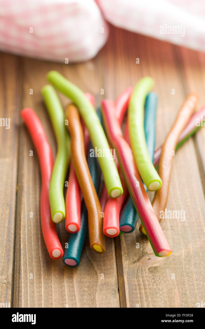 Sweet gummy sticks with different flavor. Tasty candies isolated on ...