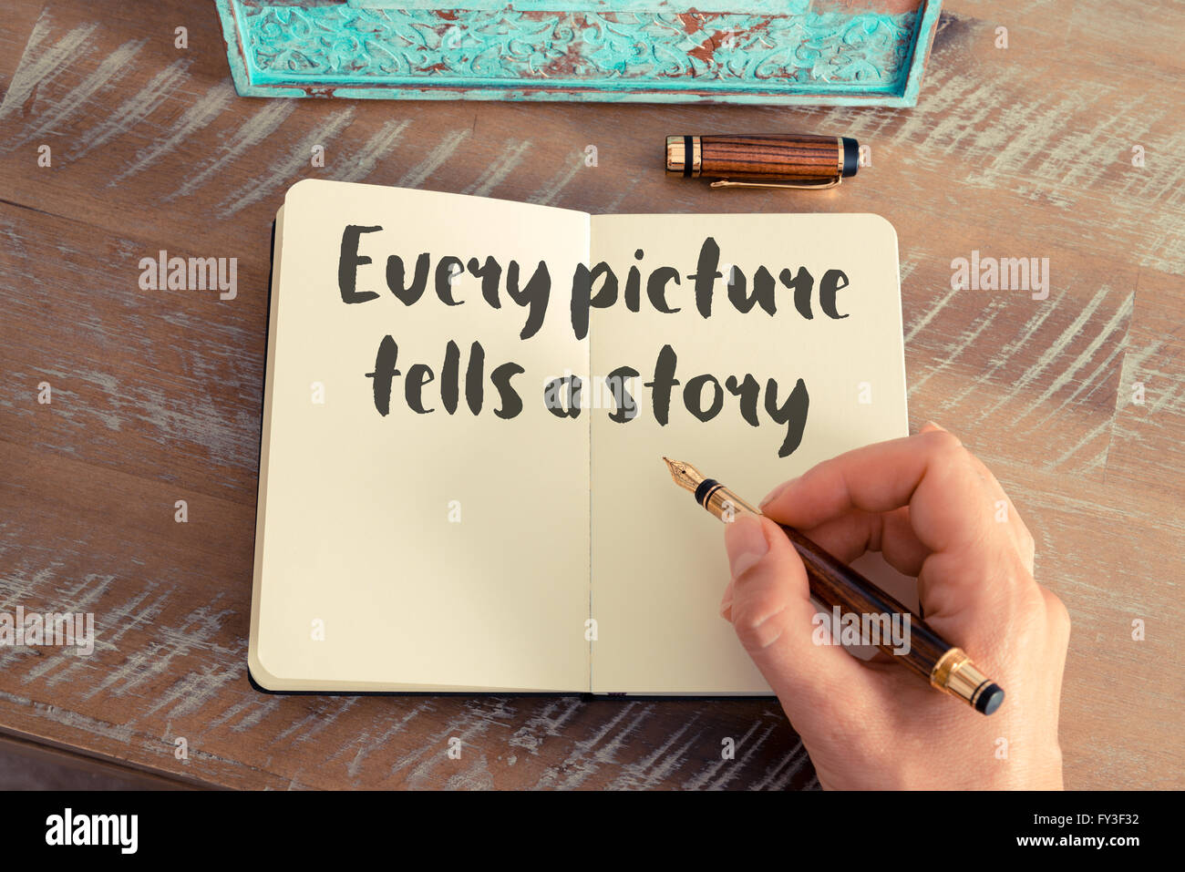 Handwritten quote Every picture tells a story Stock Photo - Alamy