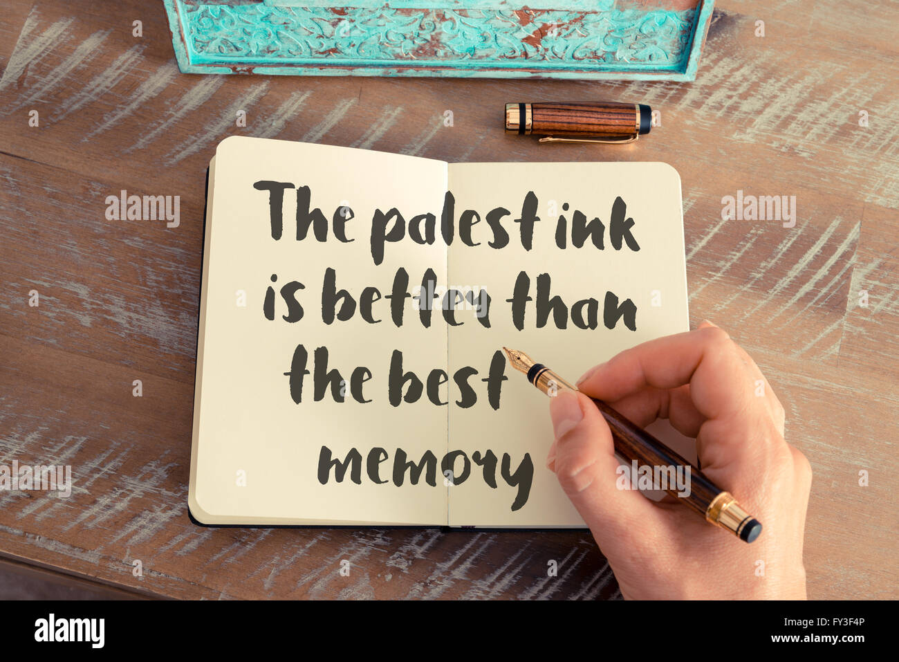 Handwritten quote The palest ink is better than the best memory Stock ...