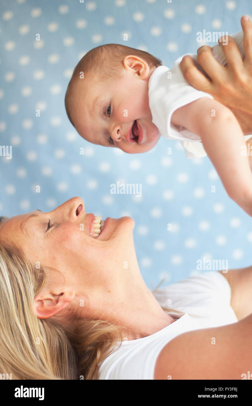Holding baby above head hi-res stock photography and images - Alamy