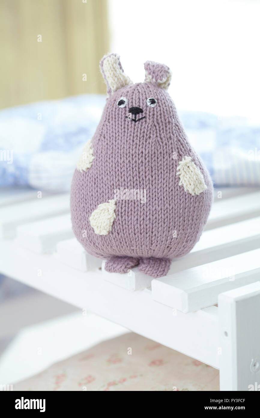 Soft knitted rabbit toy Stock Photo - Alamy