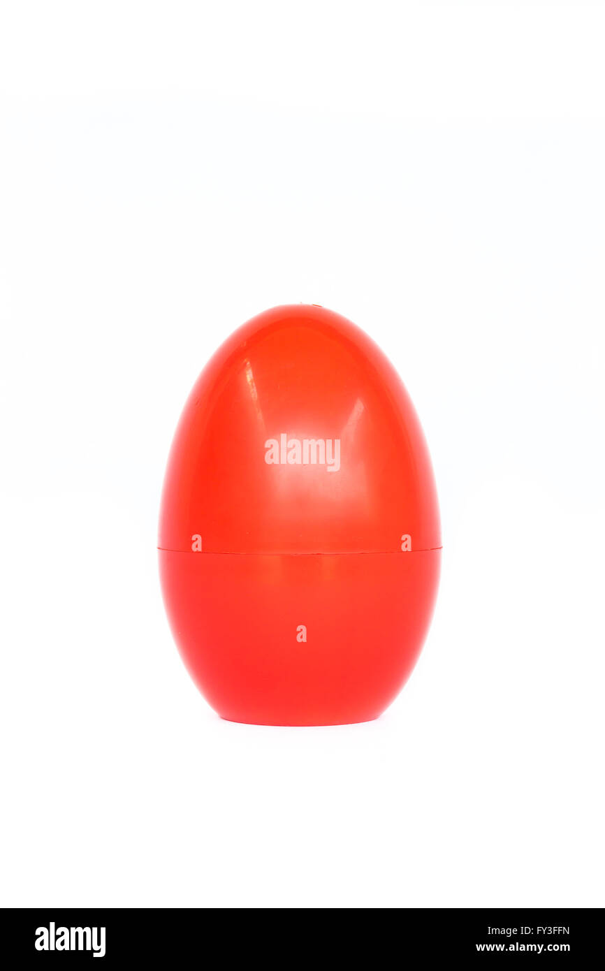 Red plastic egg on white background, stock photo Stock Photo - Alamy