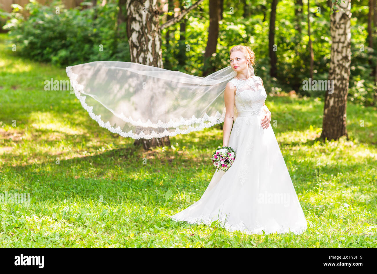 Elegant blonde bride long hair hi-res stock photography and images - Alamy