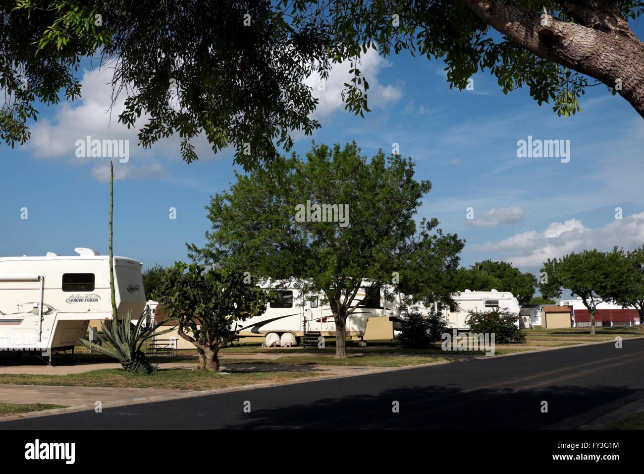 Travel trailers, fifth wheels, mobile homes and park models sit ...