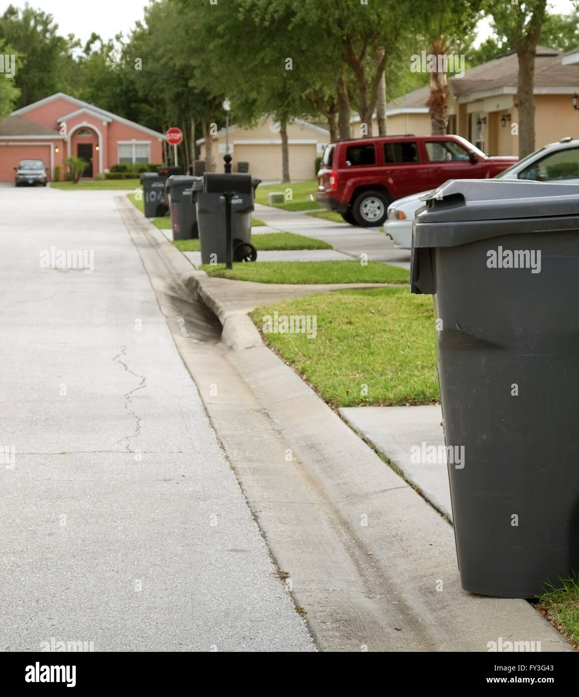 Trash carts beside road hi-res stock photography and images - Alamy
