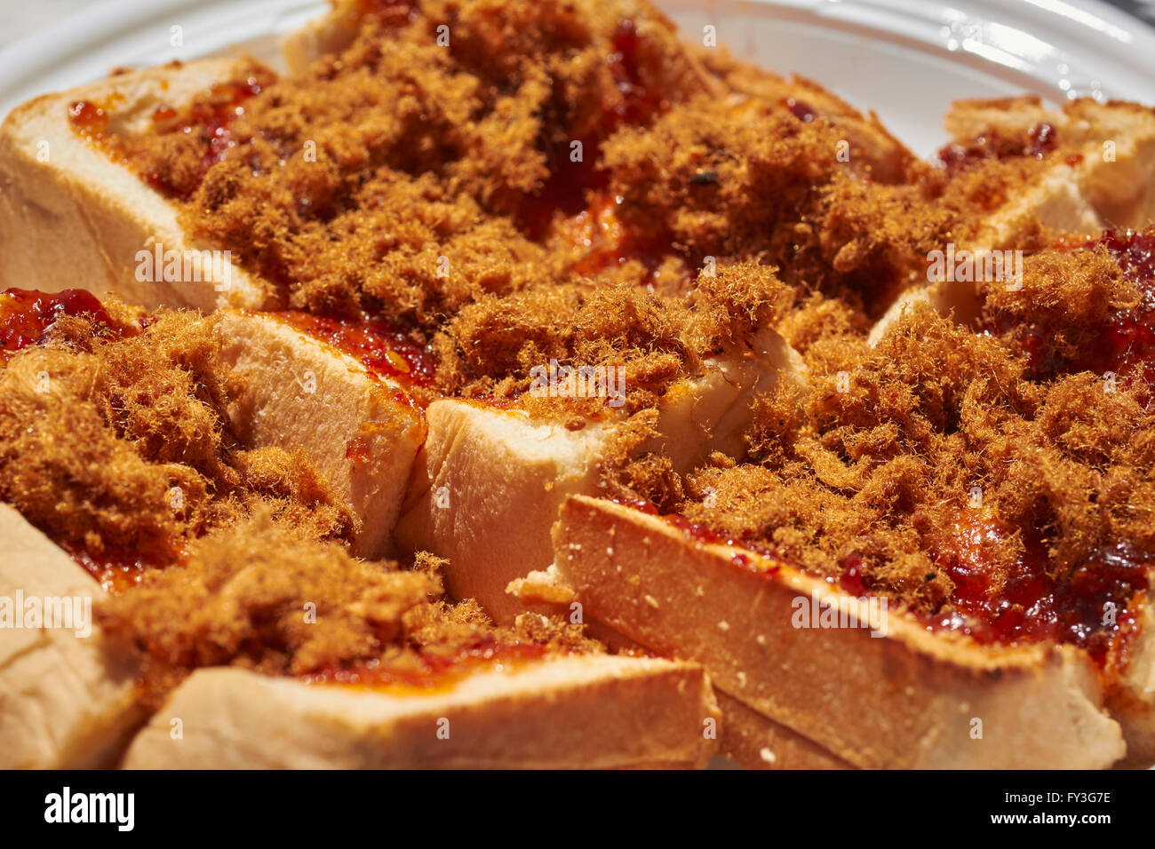 Thai style toast with pork threads and chili sauce, served in Queens ...