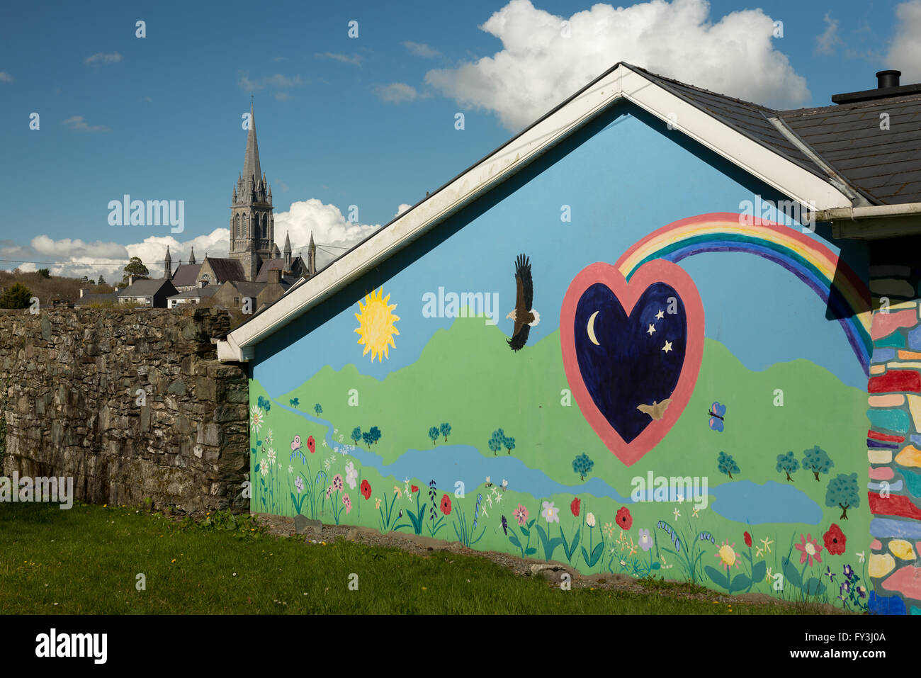 Graffiti mural wall and the St. Mary's Cathedral in Killarney, County ...