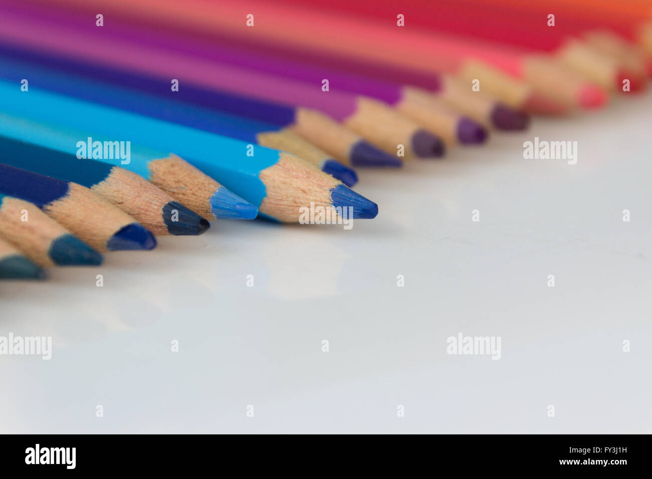 group of color pencils in a row Stock Photo - Alamy