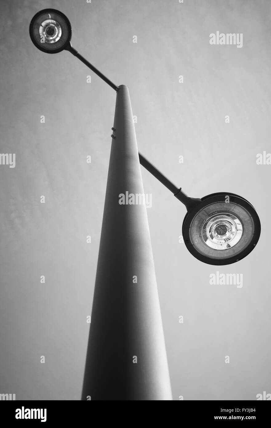 Modern street lamp in black and white. Vertical format Stock Photo - Alamy