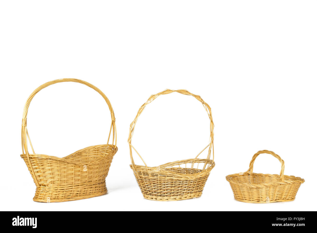 Yellow wicker baskets isolated on white. Horizontal format Stock Photo ...