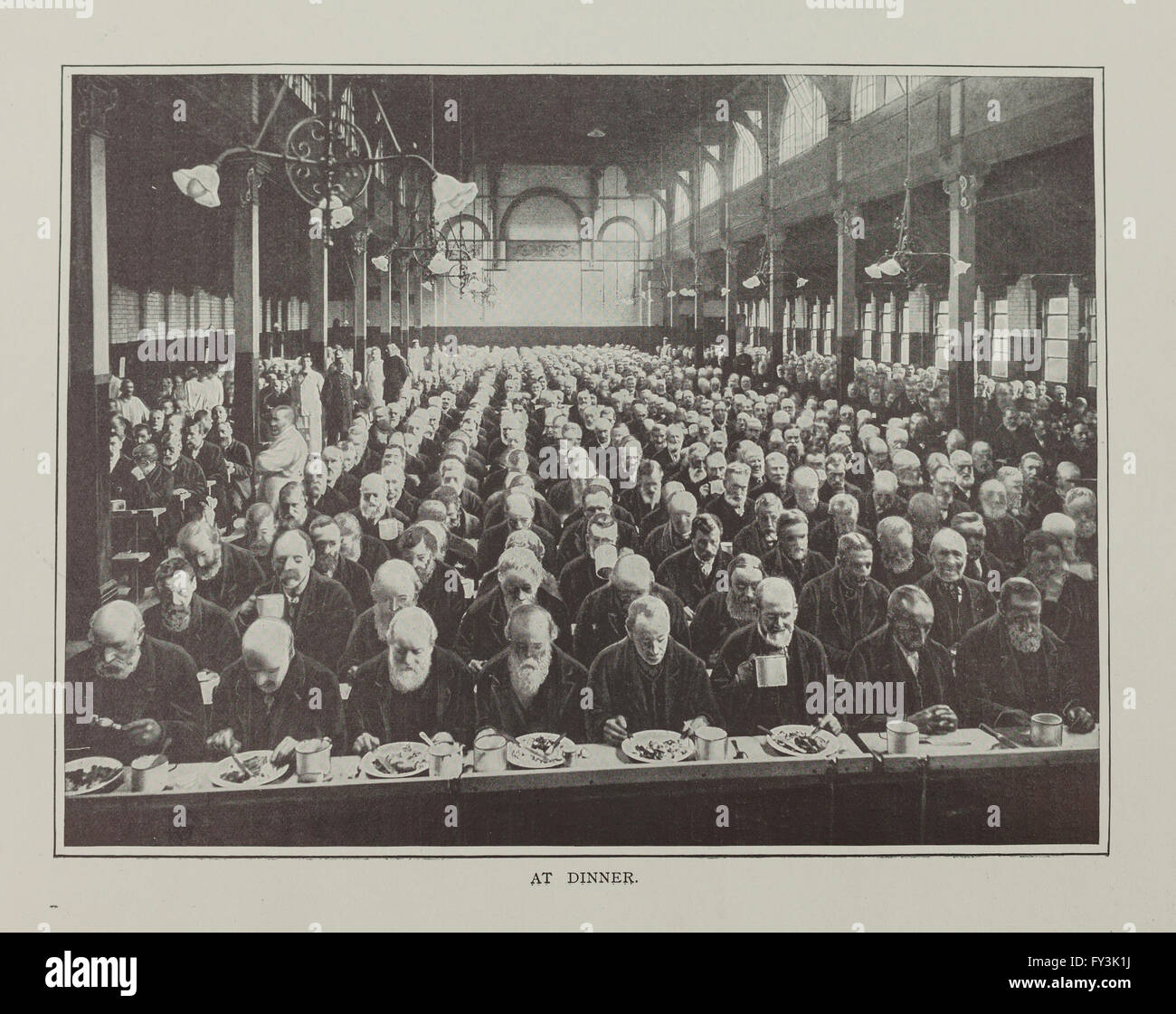 Men at dinner in St Marylebone Workhouse, London, c.1900 Stock Photo ...