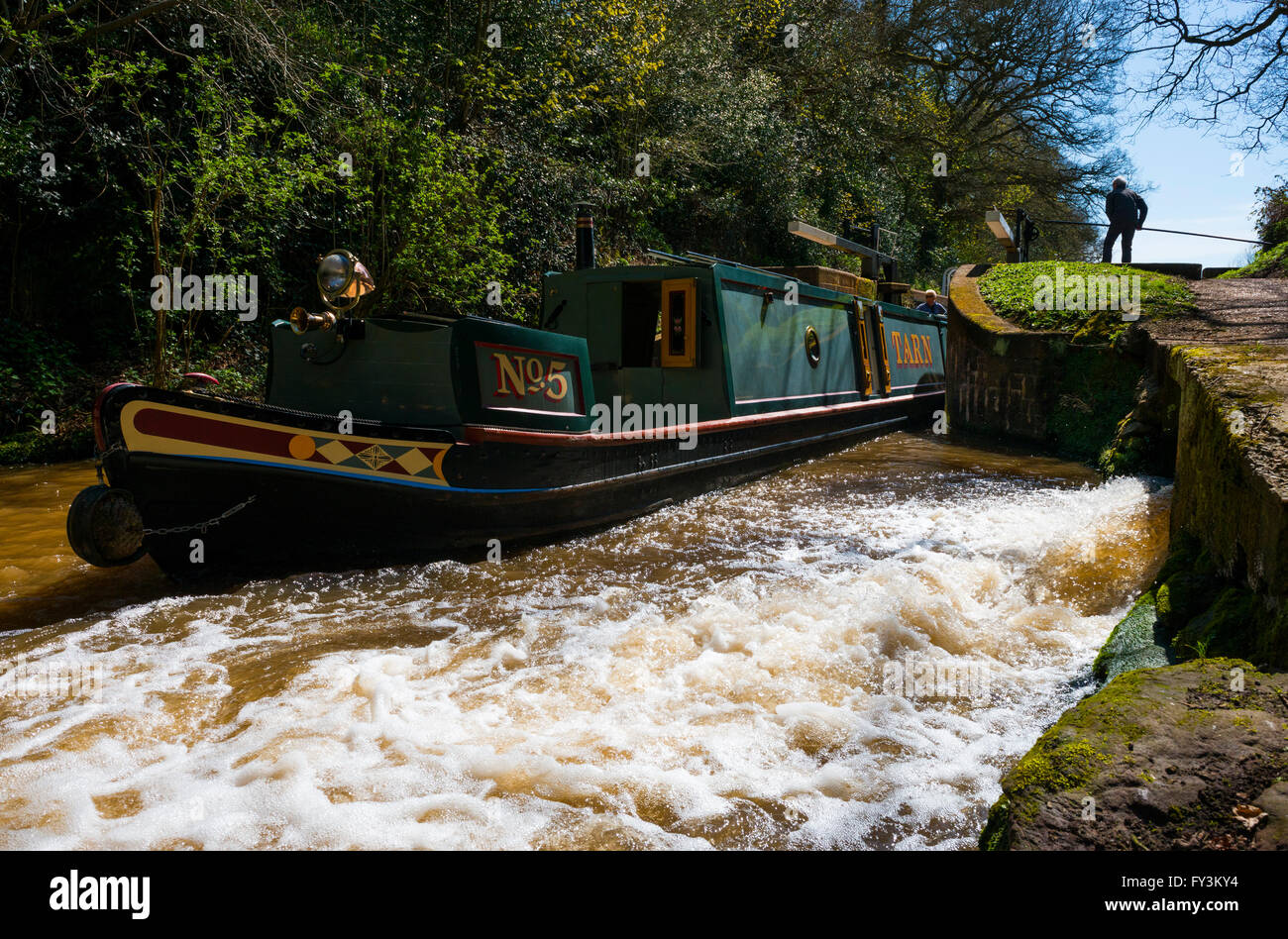 A canal boat passes through one of the locks on the Shropshire Union ...