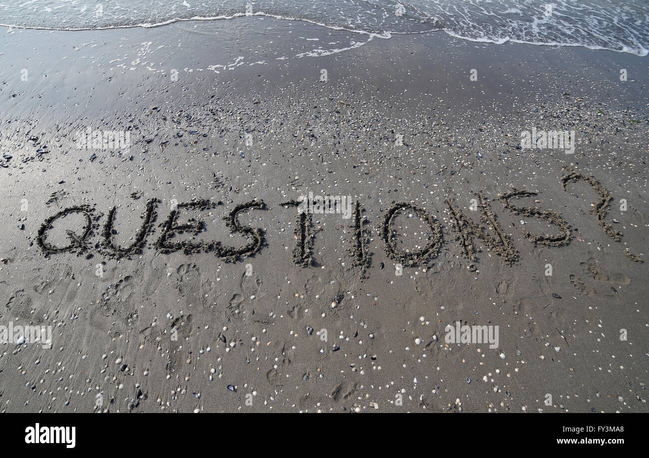 Word QUESTIONS with question mark written in large letters Stock Photo ...