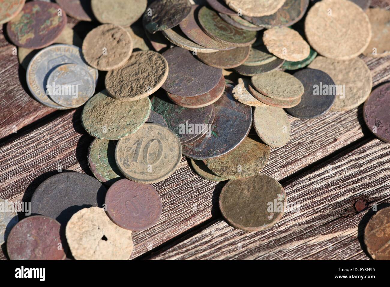 Old coins on wooden table Stock Photo - Alamy