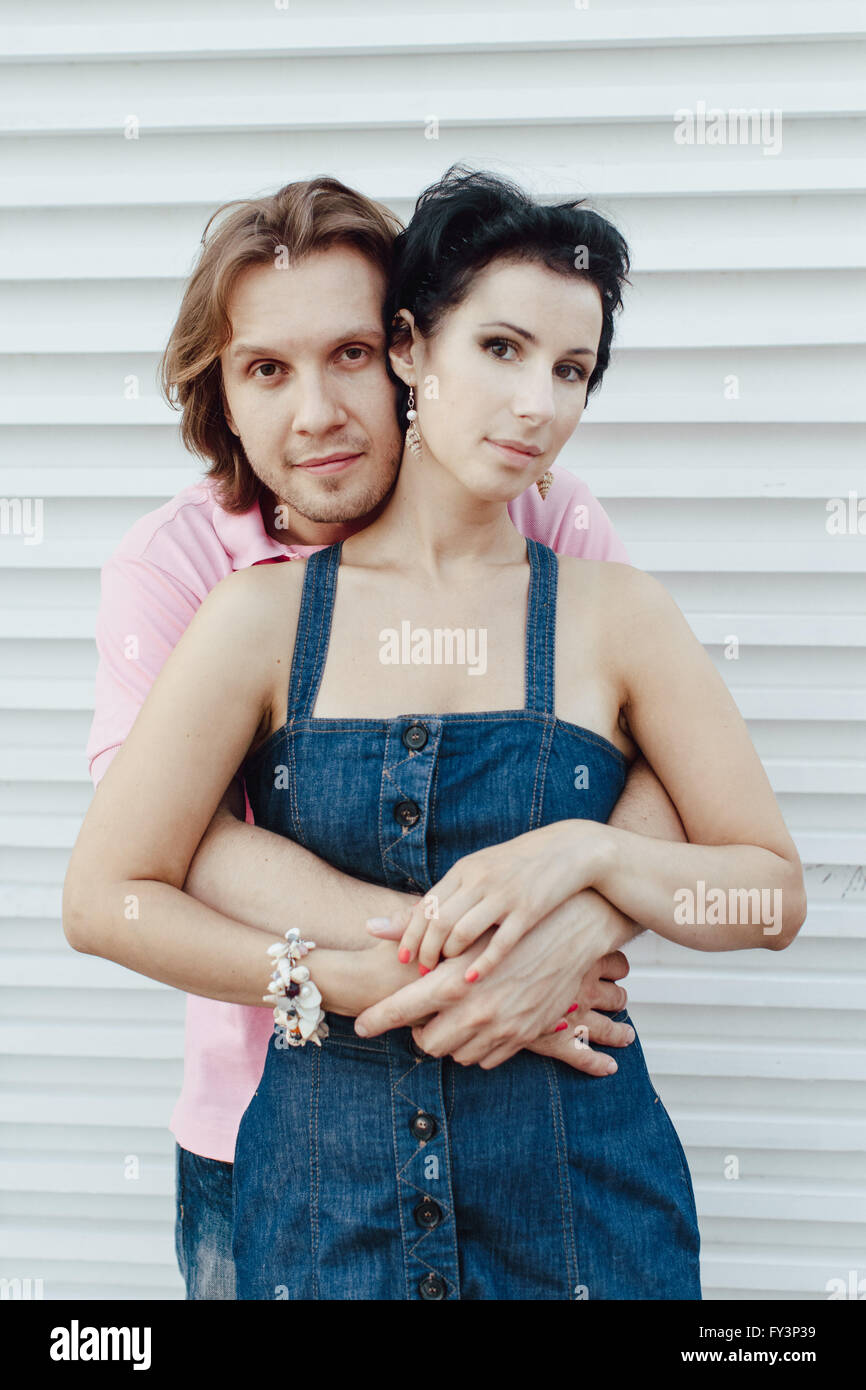 Man cuddling woman hi-res stock photography and images - Alamy