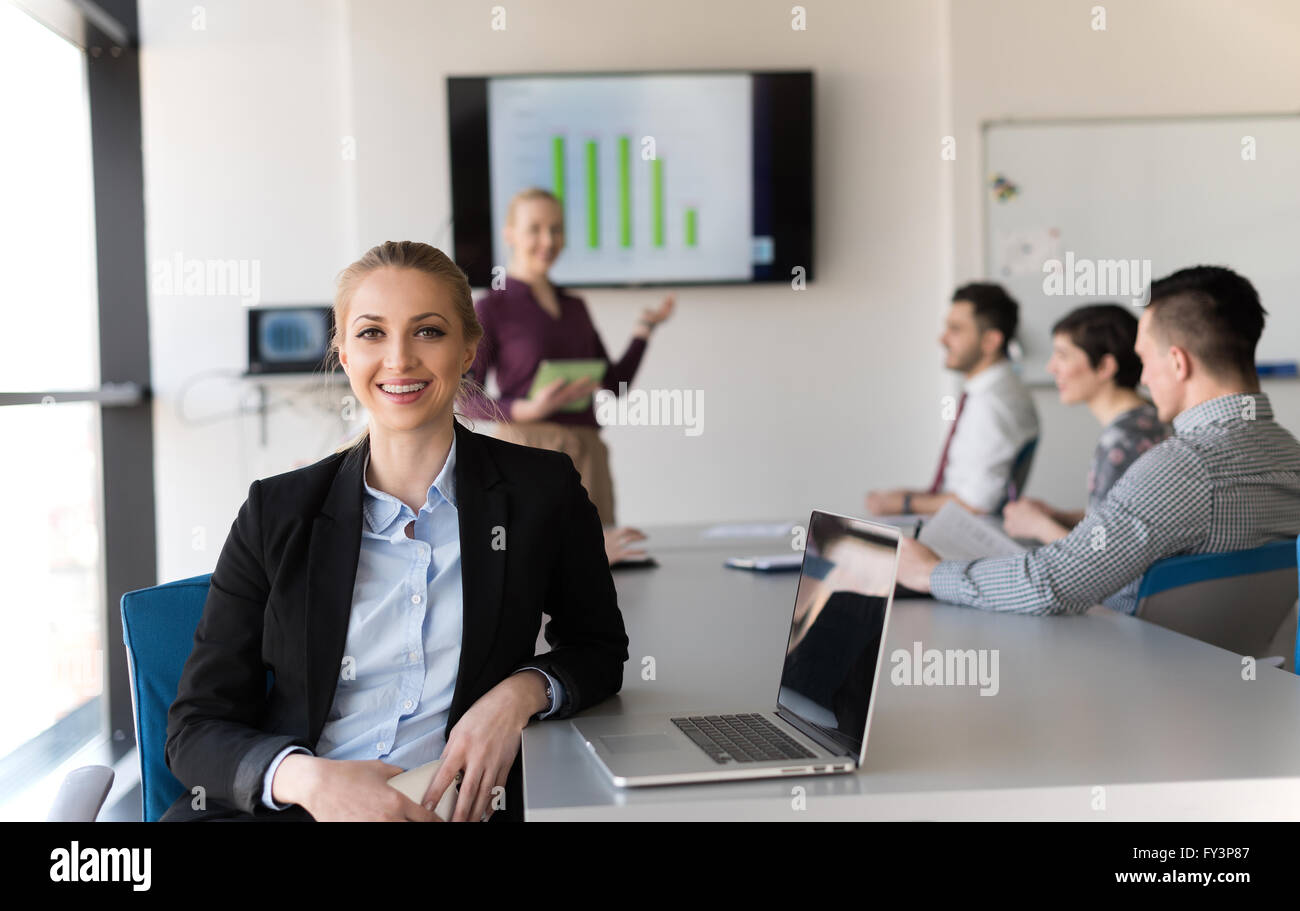 portrait of young business woman at modern startup office interior ...