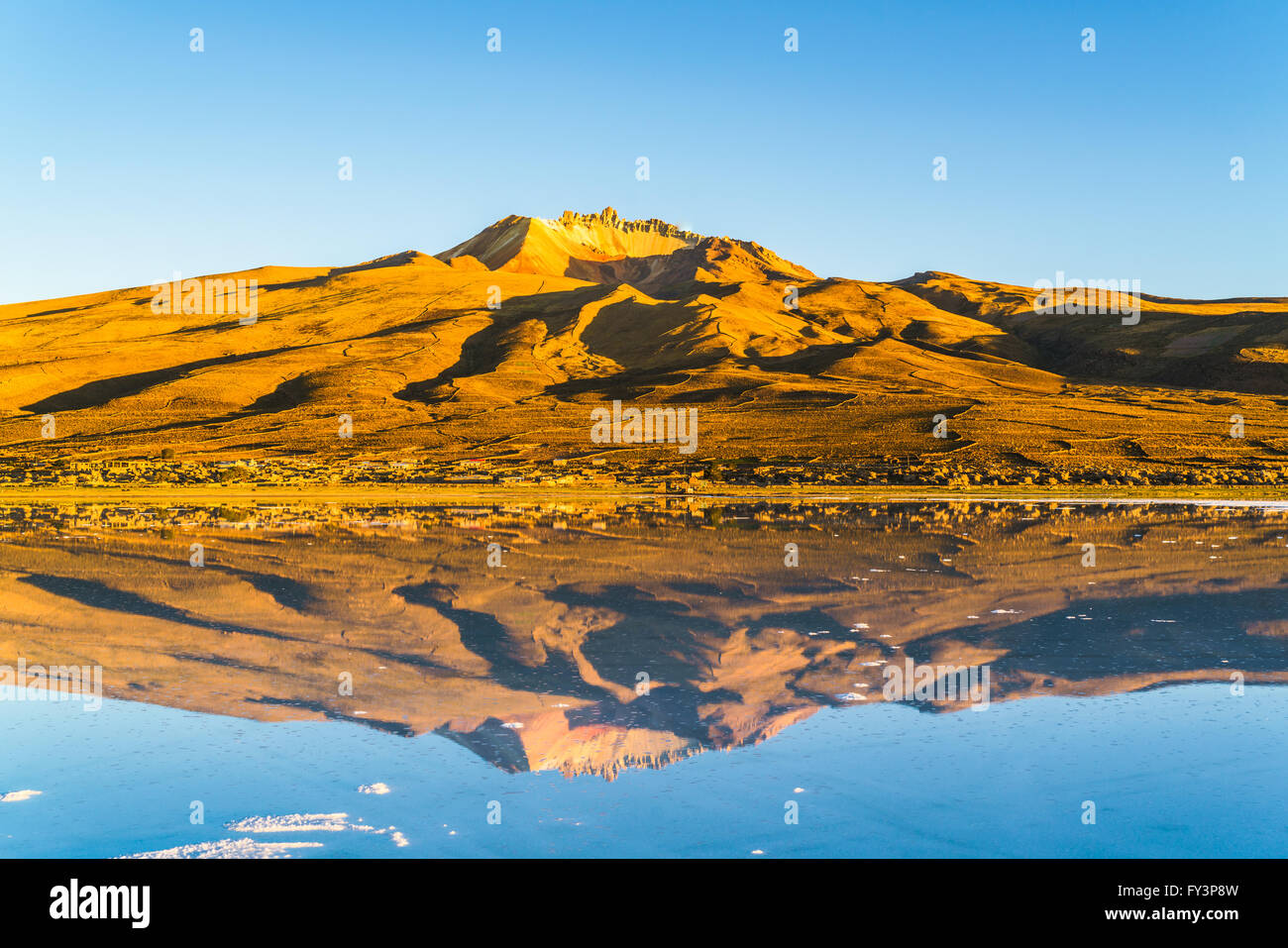 Dormant volcano at the salt lake of Solar De Uyuni in Bolivia Stock ...