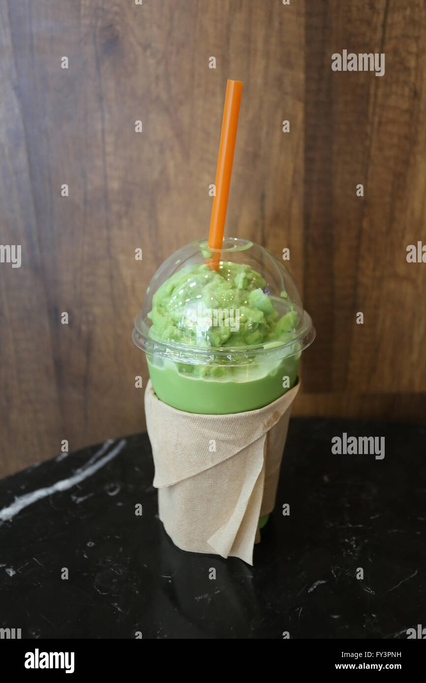 Beverage cool green tea in a glass on a table,at coffee shop Stock ...