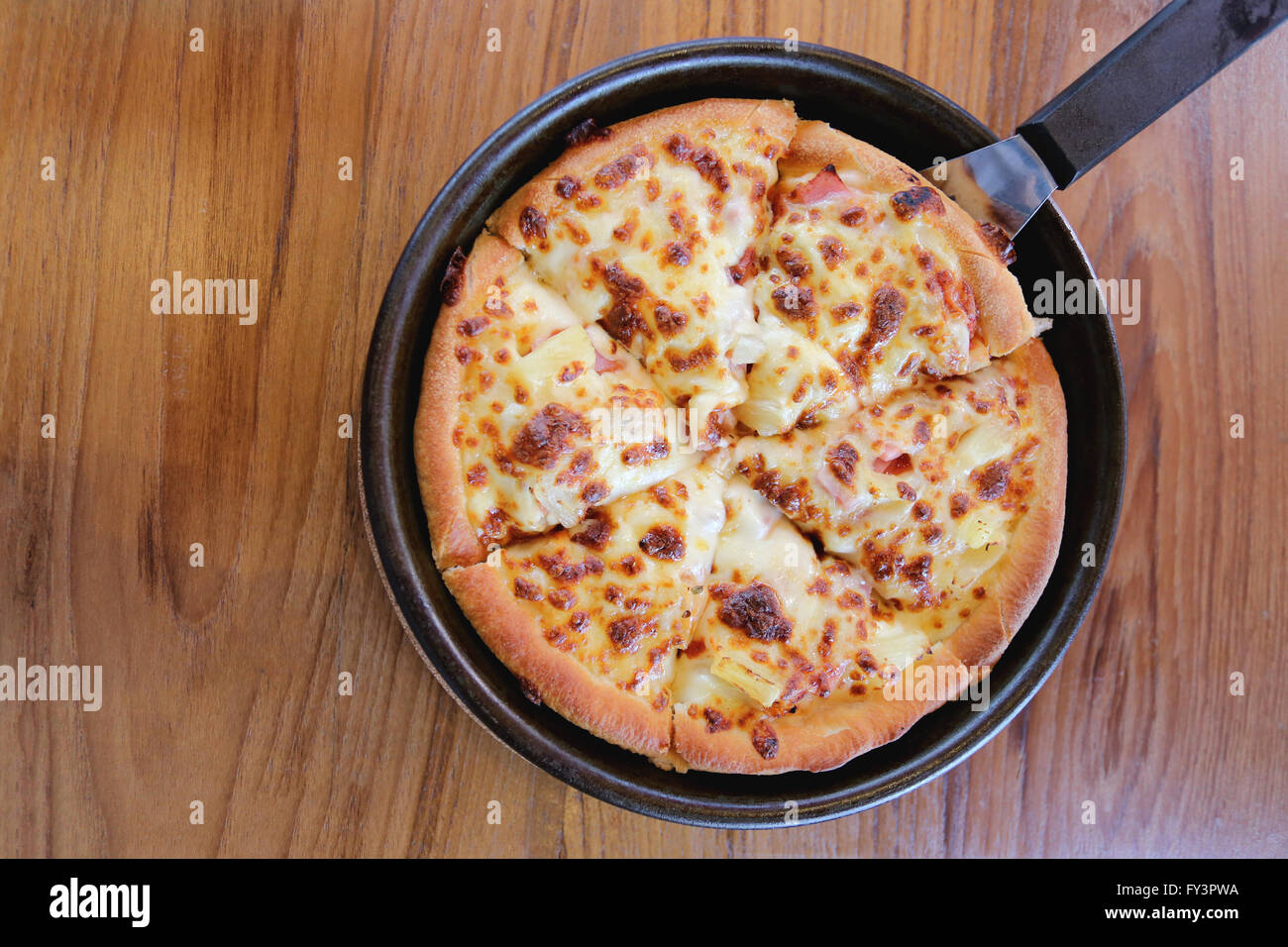 traditional of hot cheese pizza on pan in the restaurant Stock Photo ...