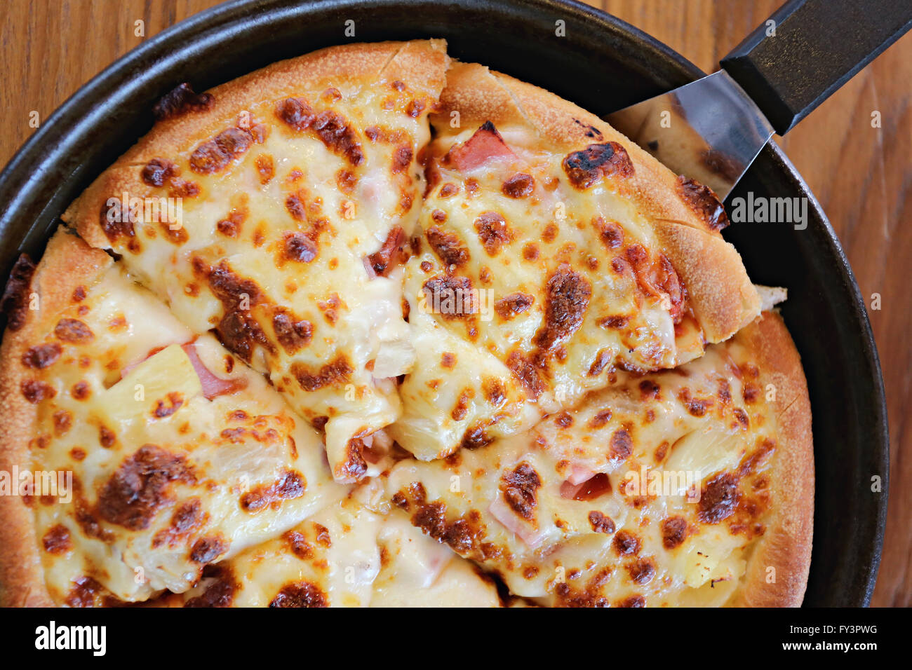 traditional of hot cheese pizza on pan in the restaurant Stock Photo ...