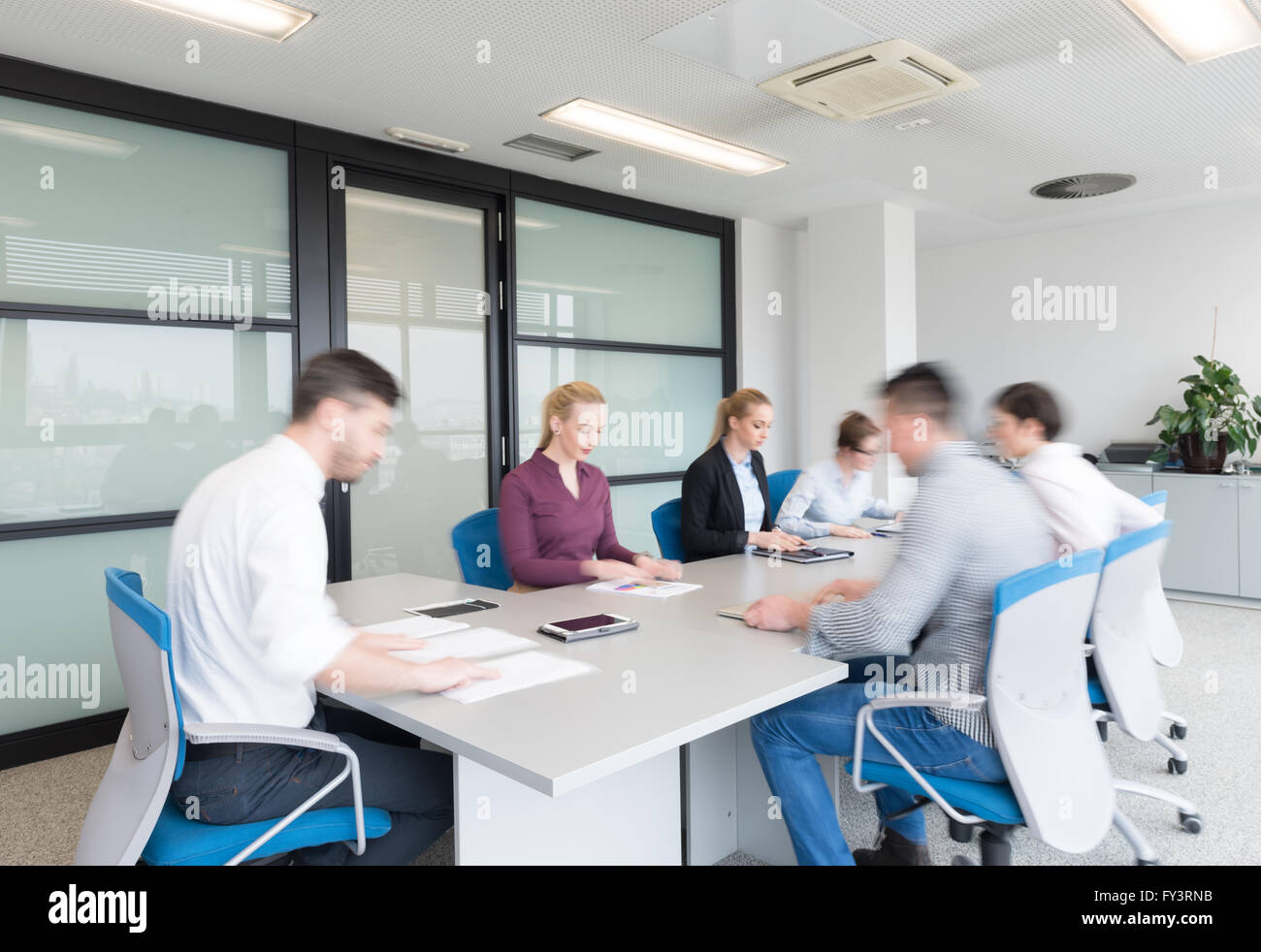Group business people entering room hi-res stock photography and images ...