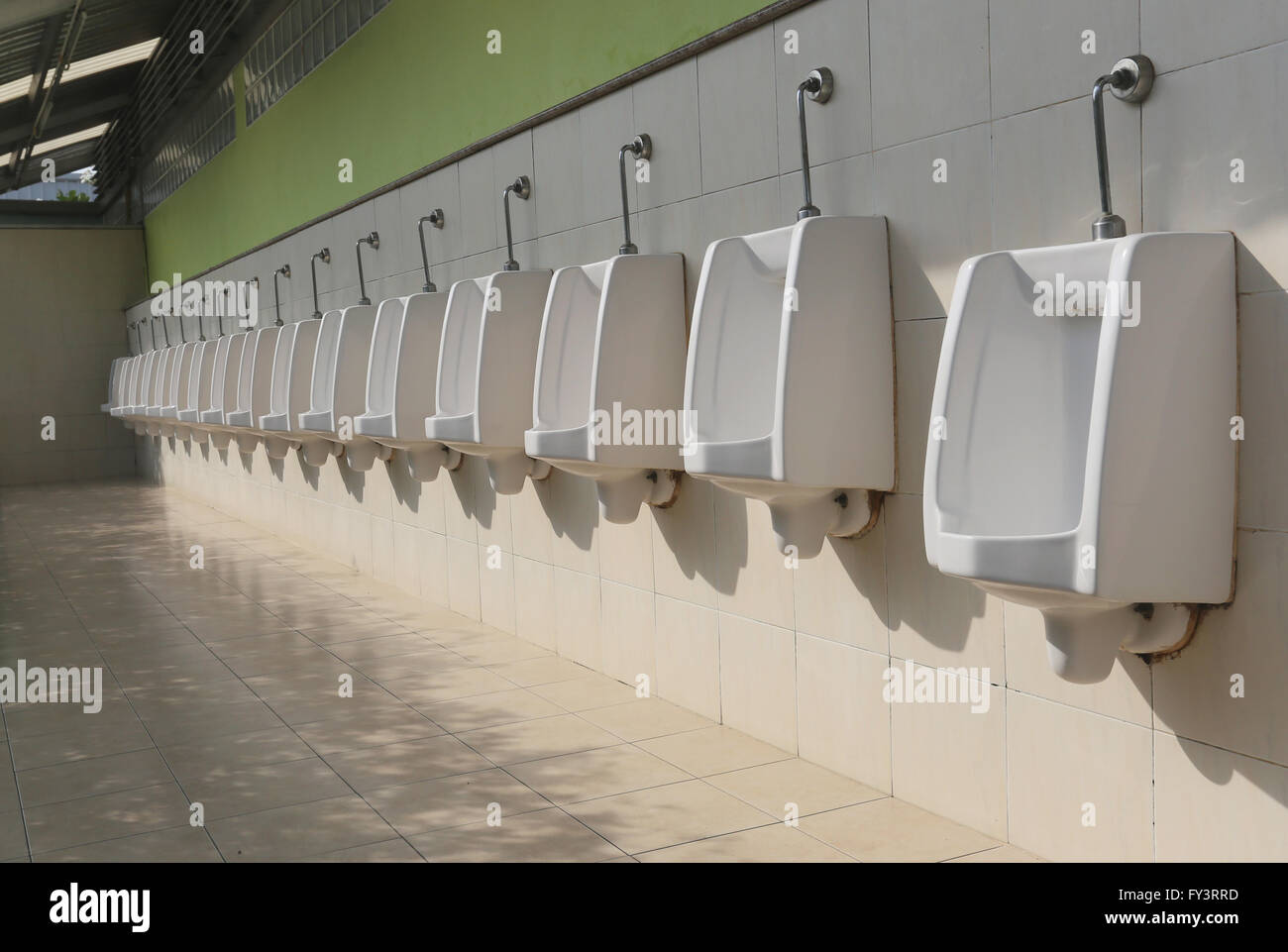 white ceramic of urinals in men's bathroom,sanitary ware for men Stock ...