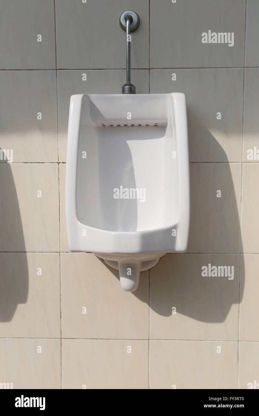 white ceramic of urinals in men's bathroom,sanitary ware for men Stock ...