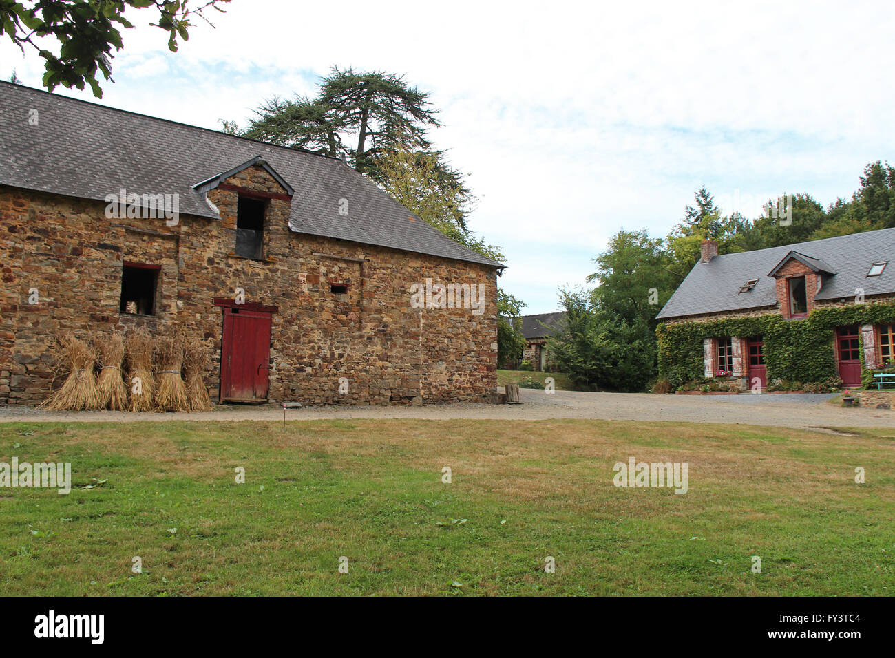 A barn and a house in the park of a farm closed to Nantes (France Stock ...