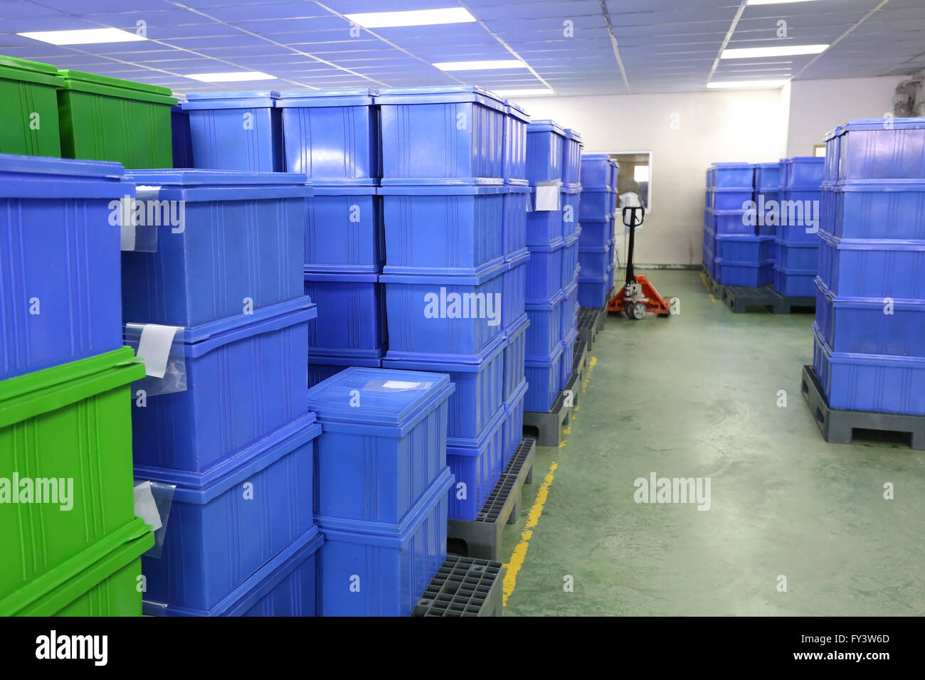 blue Plastic box products in Industrial factory room,Container of ...