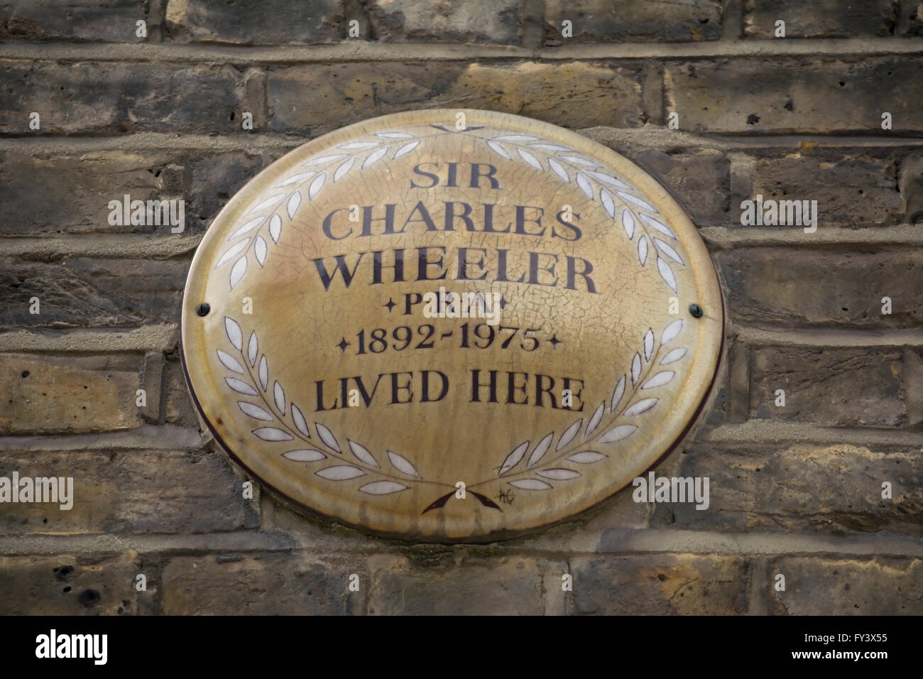 wall plaque marking a home of sir charles wheeler, sculptor and ...