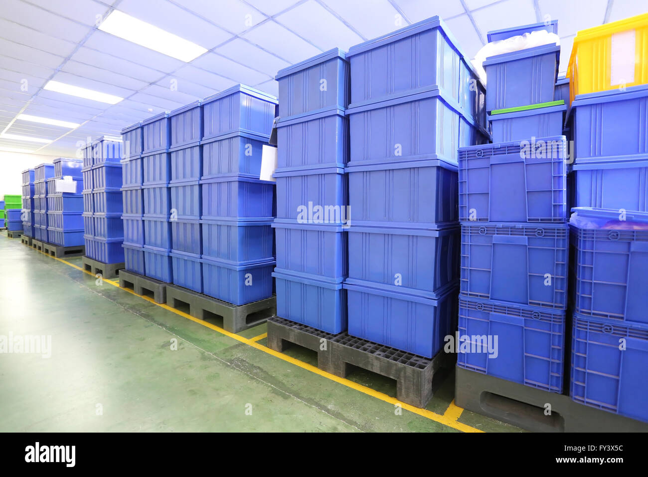 blue Plastic box products in Industrial factory room,Container of ...