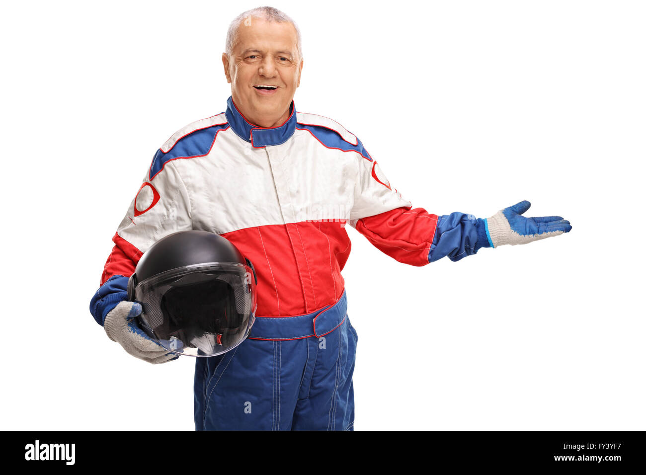 Mature car racer in a racing suit gesturing with his hand isolated on ...