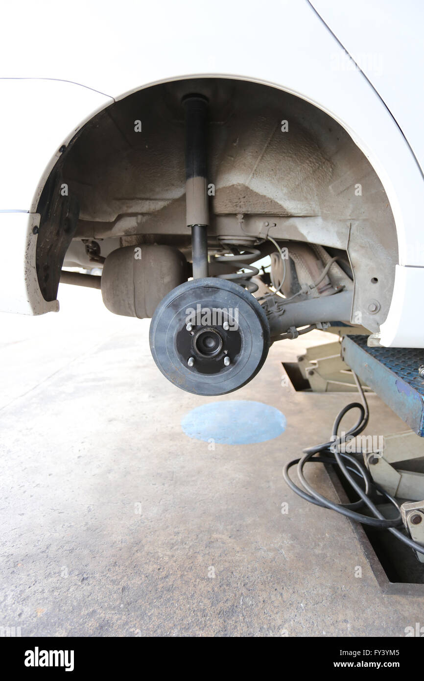 Wheel hub of a car in repair of the damage,Garage shop Stock Photo - Alamy