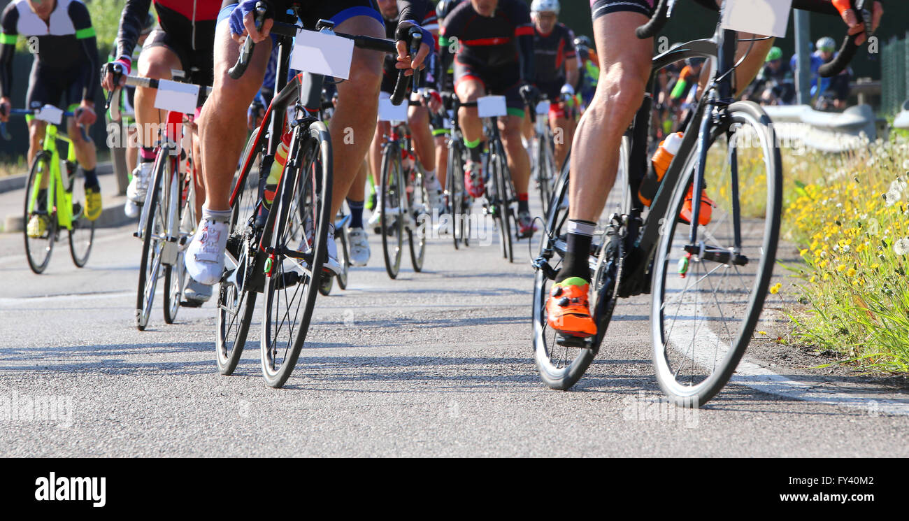 many racing bikes led by trained cyclists during the street race Stock ...