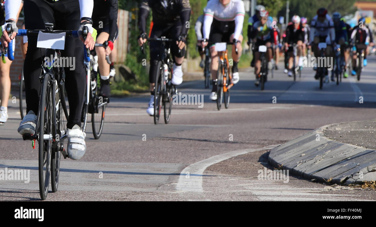cyclists with fast race bike during the cycling race on asphalt road ...