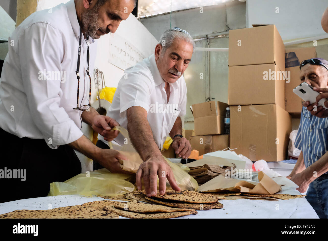 Jerusalem, Israel. 21st April, 2016. Jewish men prepare matzah ...